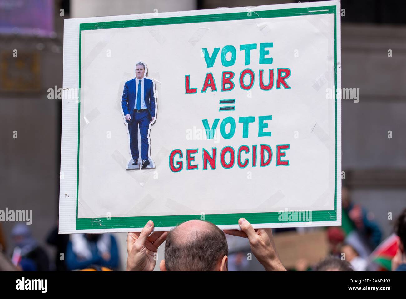 Vote Labour equals vote genocide sign at Palestine Gaza war protests in ...