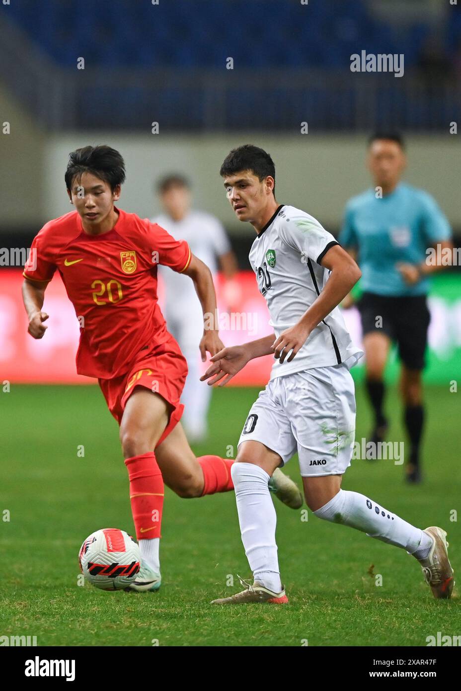 Weinan, China's Shaanxi Province. 8th June, 2024. Dilshod Abdullaev (R ...