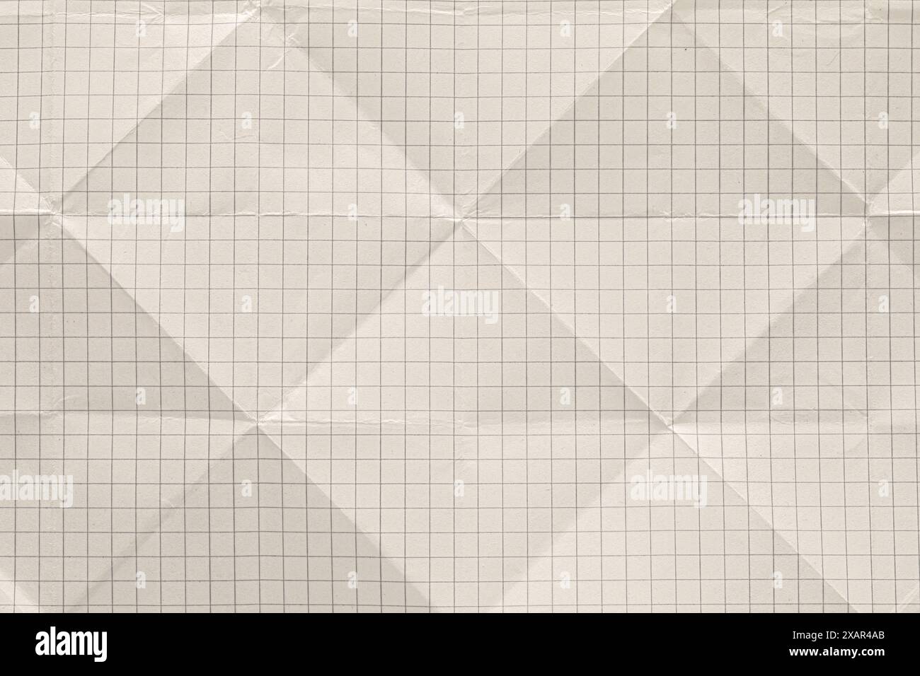 Folded Grid Paper With Creases And Light Shadows Stock Photo - Alamy