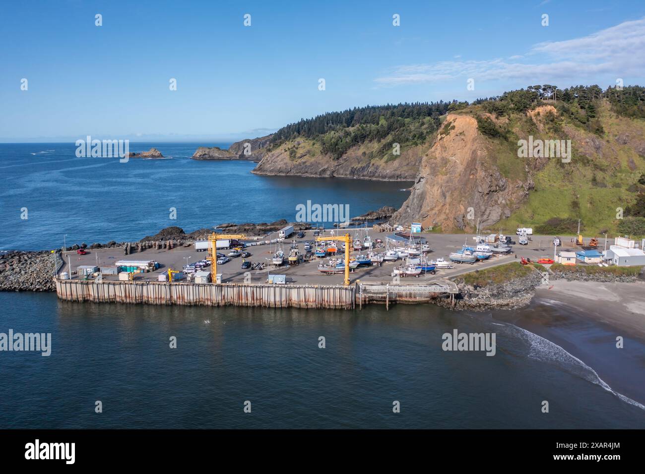 Port Orford, Oregon, is one of only two dolly docks in the U.S Stock ...