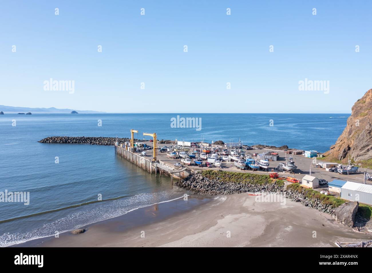Port Orford, Oregon, is one of only two dolly docks in the U.S Stock ...