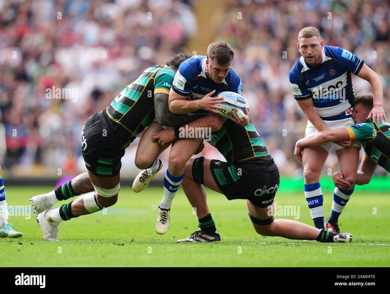 Bath Rugby's Matt Gallagher is tackled by Northampton Saints' Courtney ...