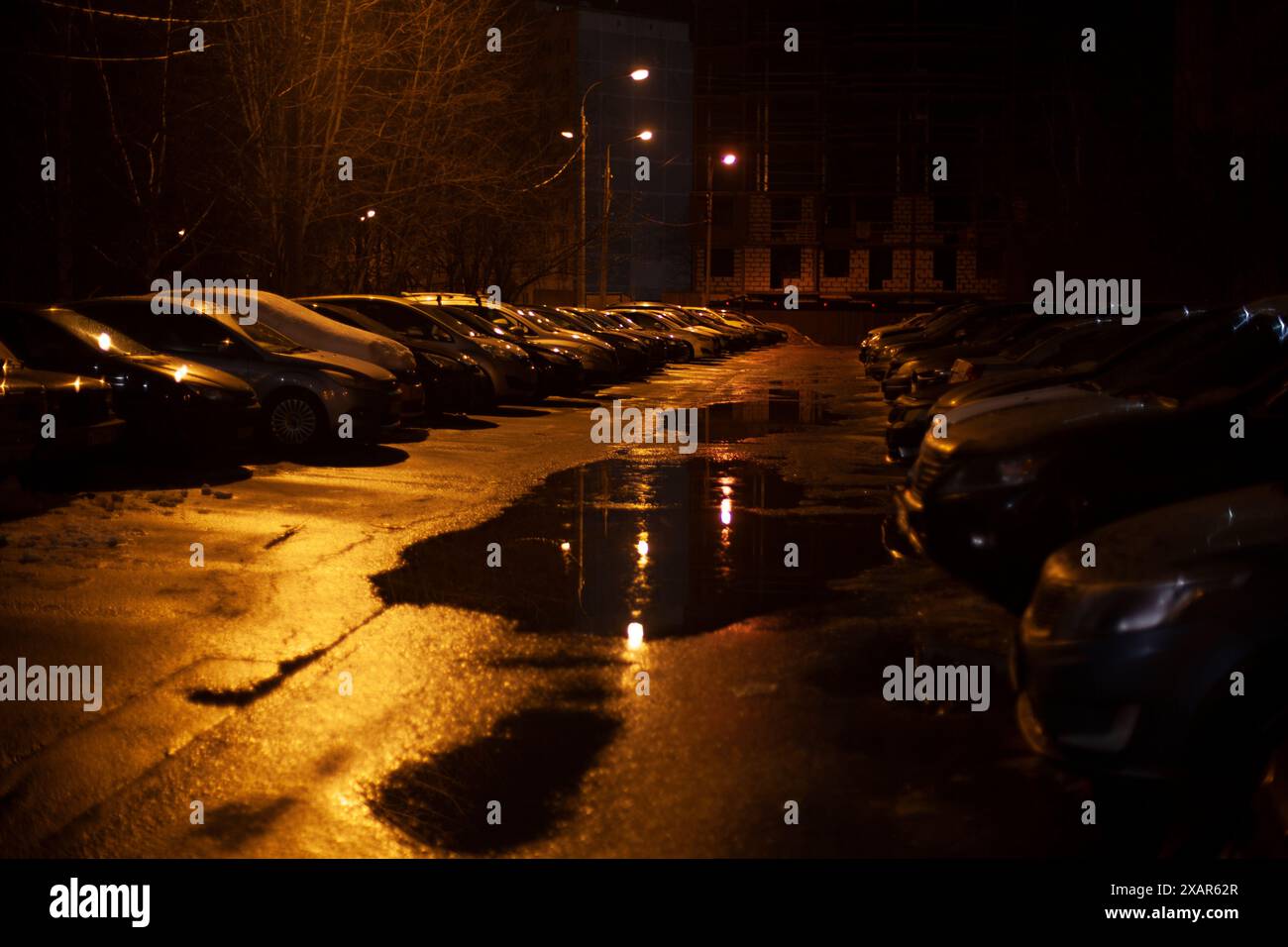 Parking at night. City at night. Cars in the parking lot on the street ...