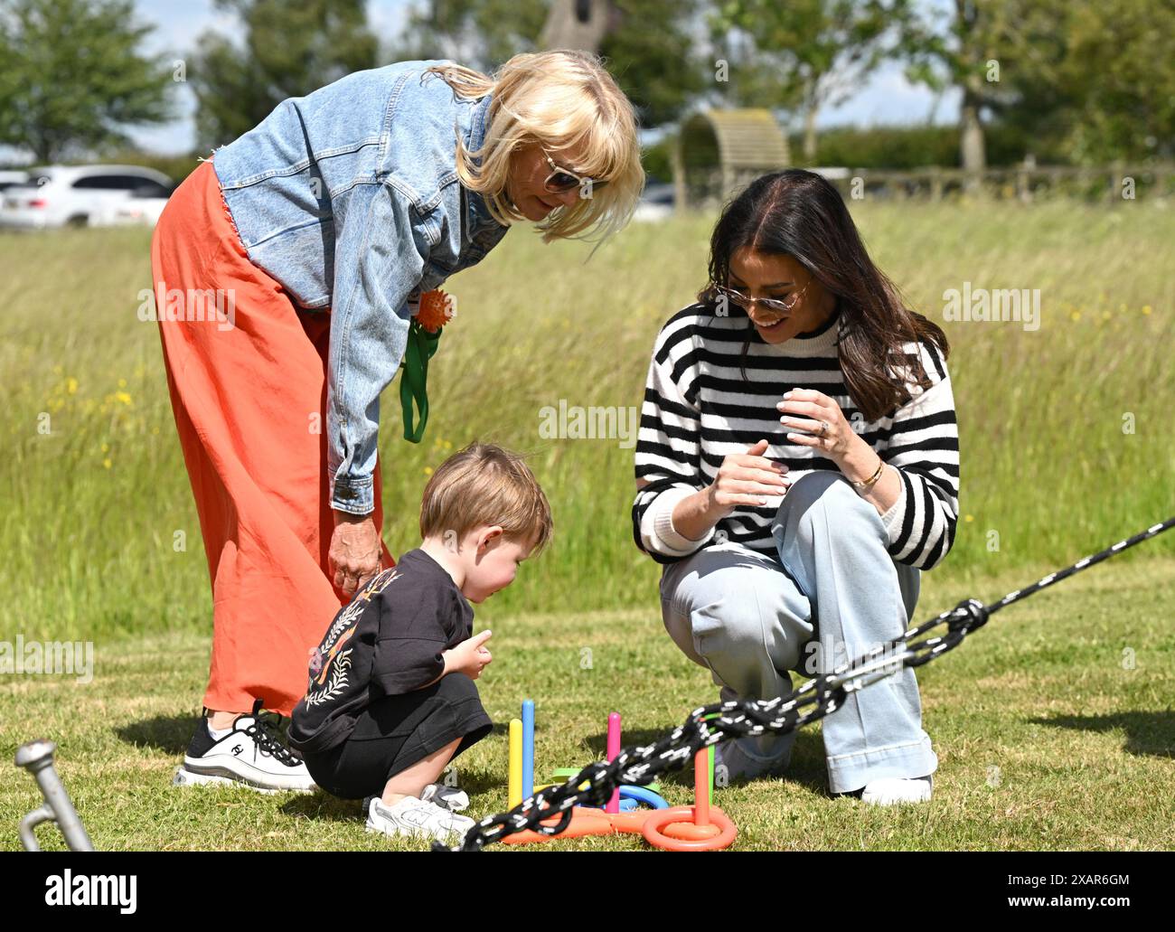EDITORIAL USE ONLY Carol Wright (left), Jess Wright and son Presley ...