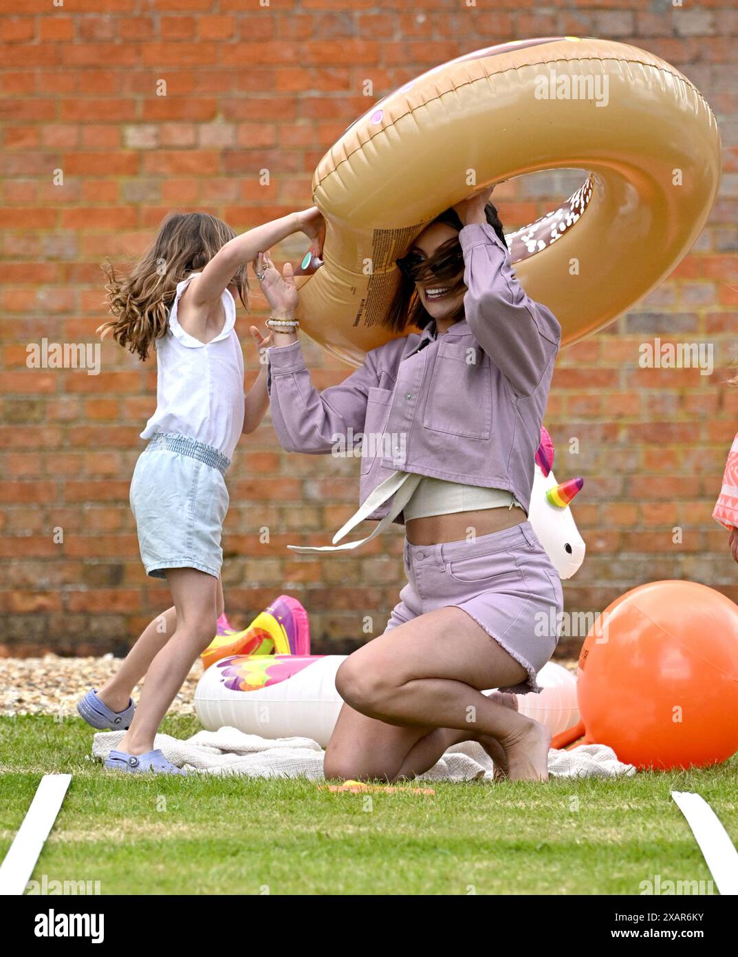 EDITORIAL USE ONLY Fern McCann and daughter Sunday, six, take part in ...