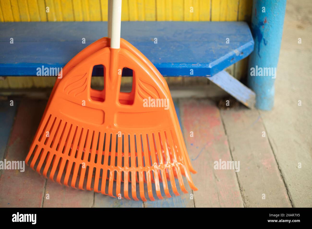 Garden tools for cleaning. Orange Tool. Cleaning on terrace. Restoring ...