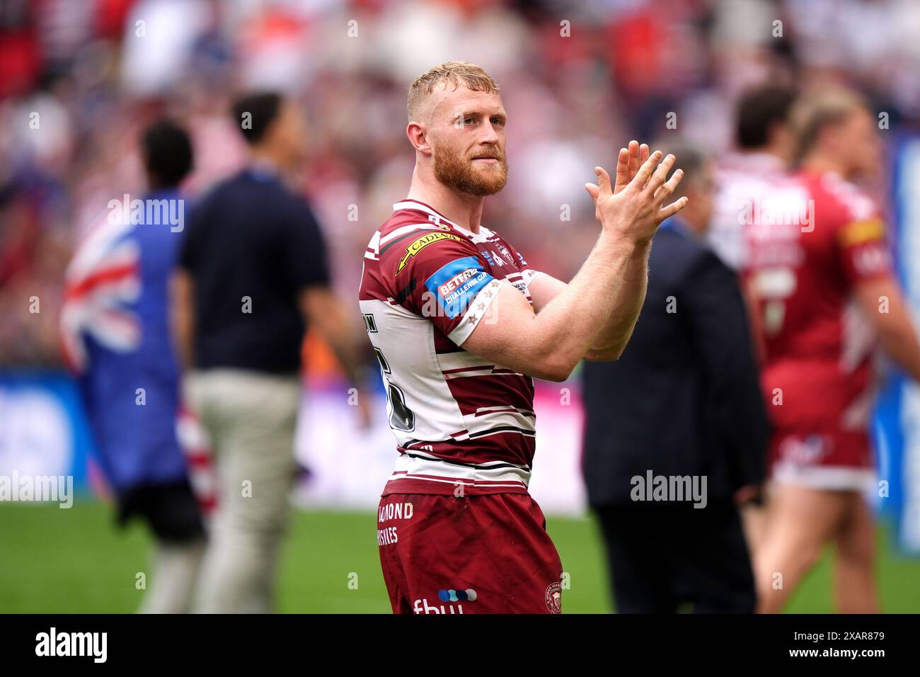 Wigan Warriors' Luke Thompson appaluds the fans after the final whistle ...