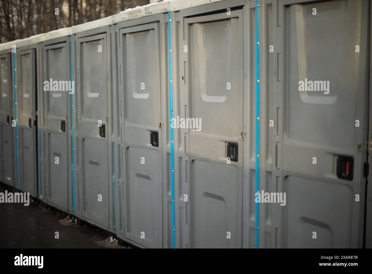 Toilets on street. Organization of public restrooms. Booths are in row ...