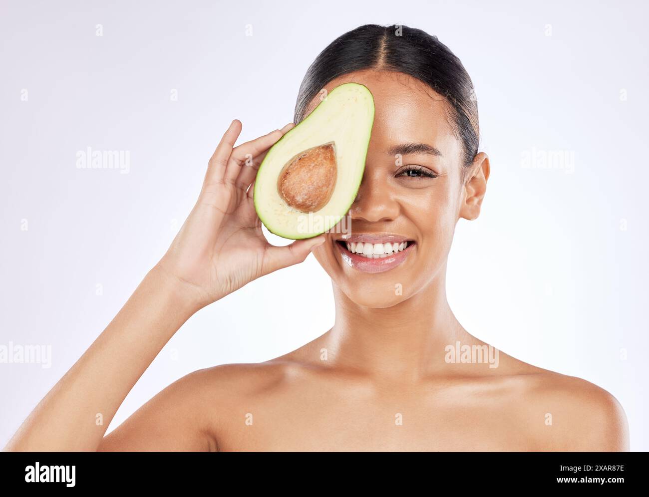 Woman, studio and avocado with natural beauty for skincare with ...