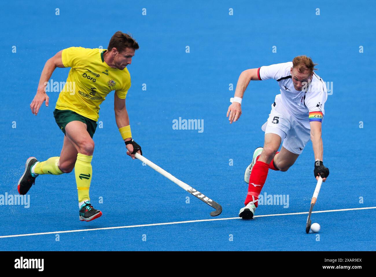 Great Britain's David Ames battles for the ball against Australia's Tom ...