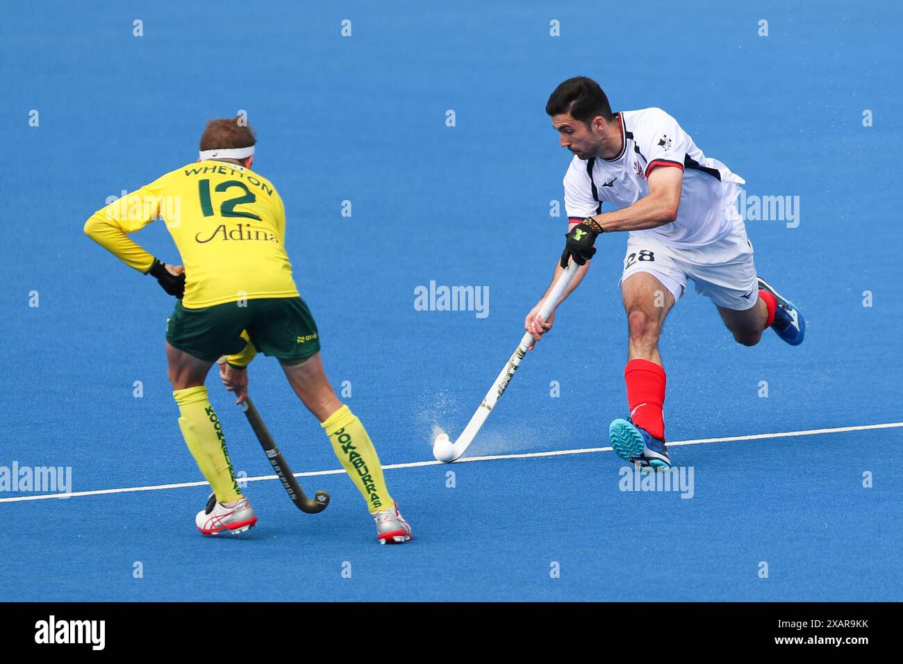 Great Britain's Lee Morton battles for the ball against Australia's ...