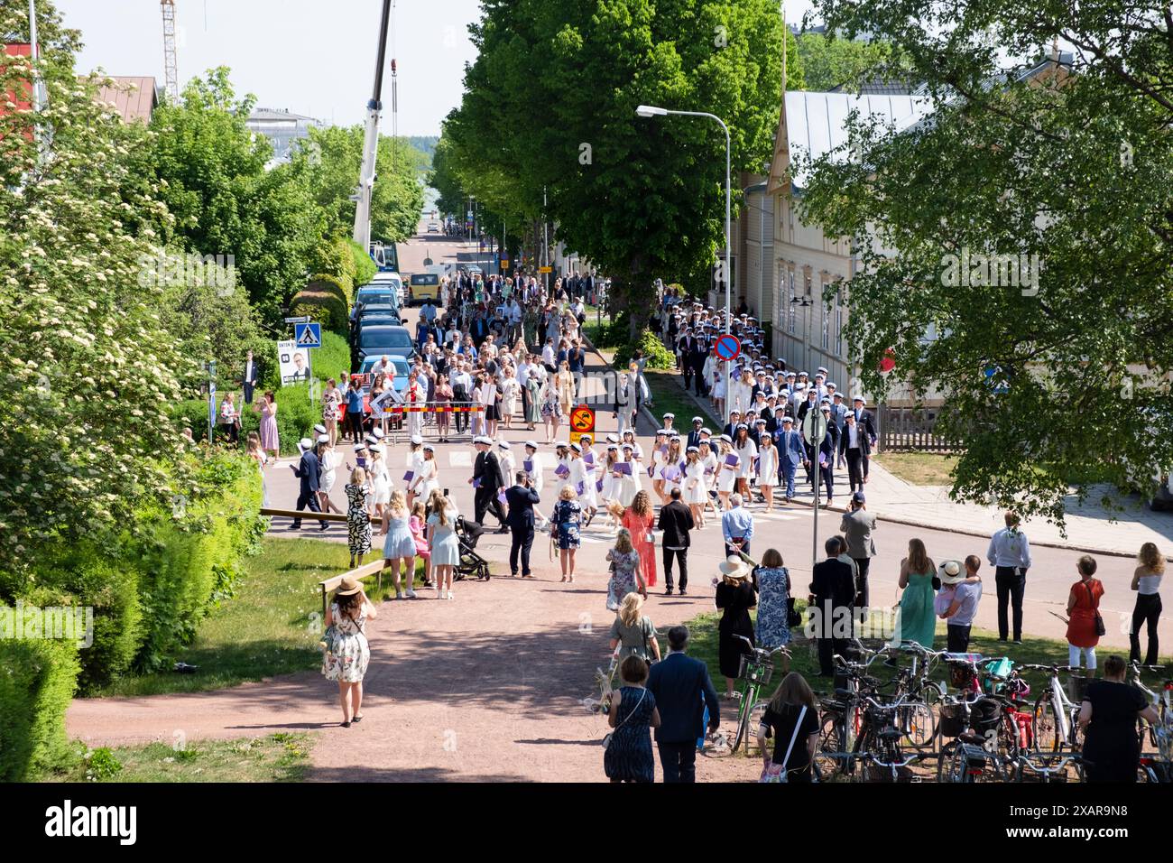 The new school graduates march through the streets of Mariehamn from ...