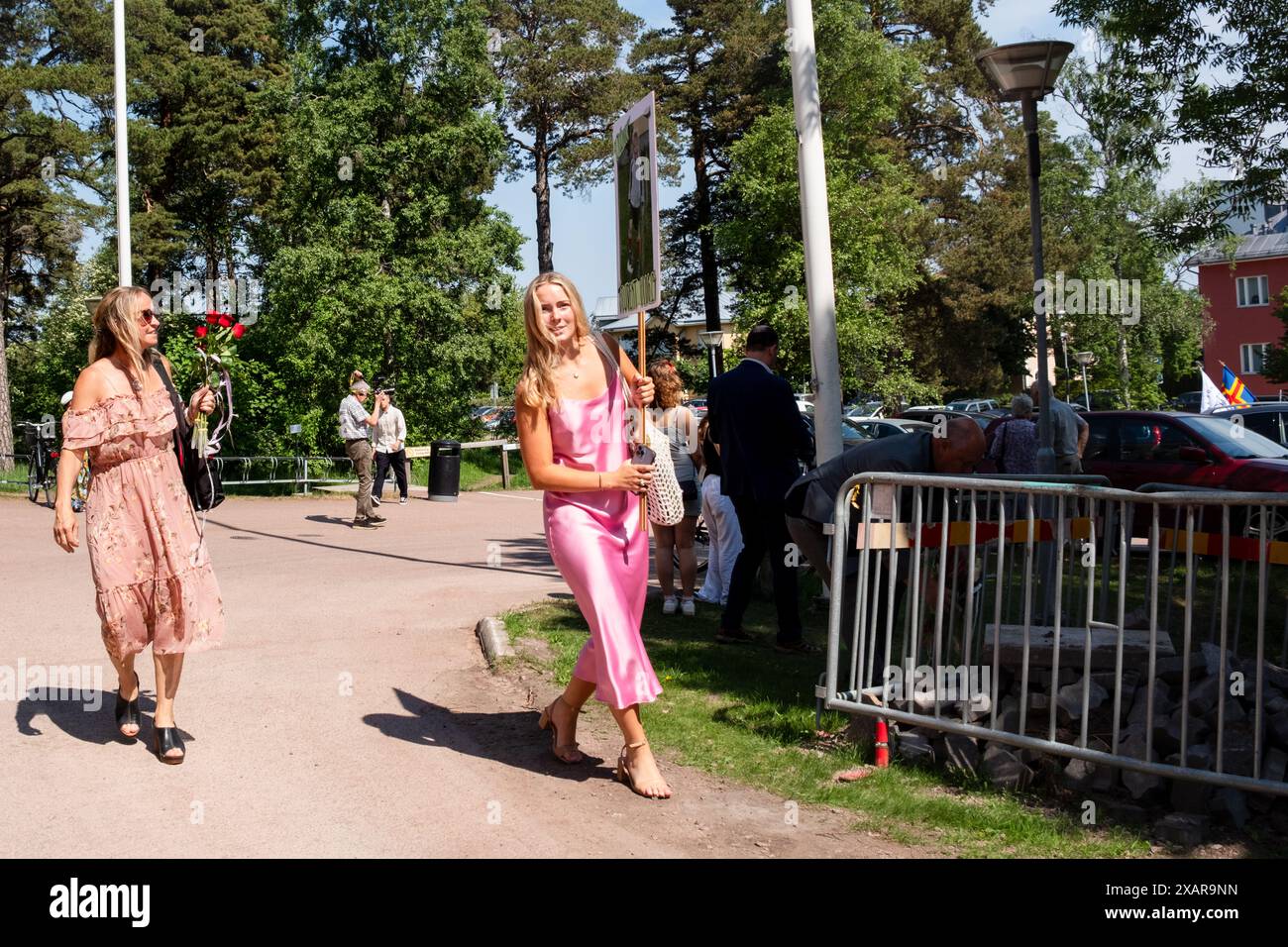 Families gather outside the main school building for Åland Graduation ...