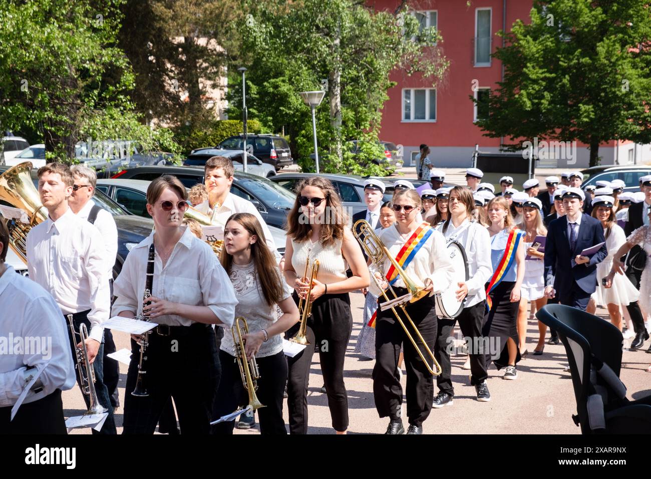 The new school graduates march through the streets of Mariehamn from ...