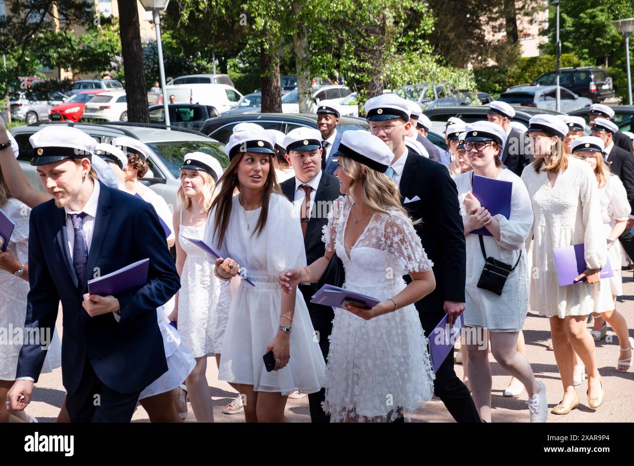 The new school graduates march through the streets of Mariehamn from ...