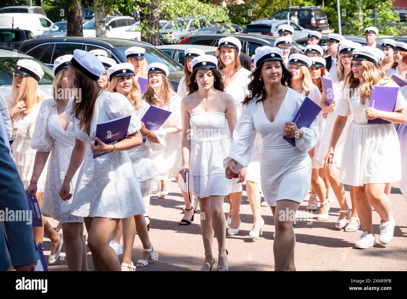 The new school graduates march through the streets of Mariehamn from ...