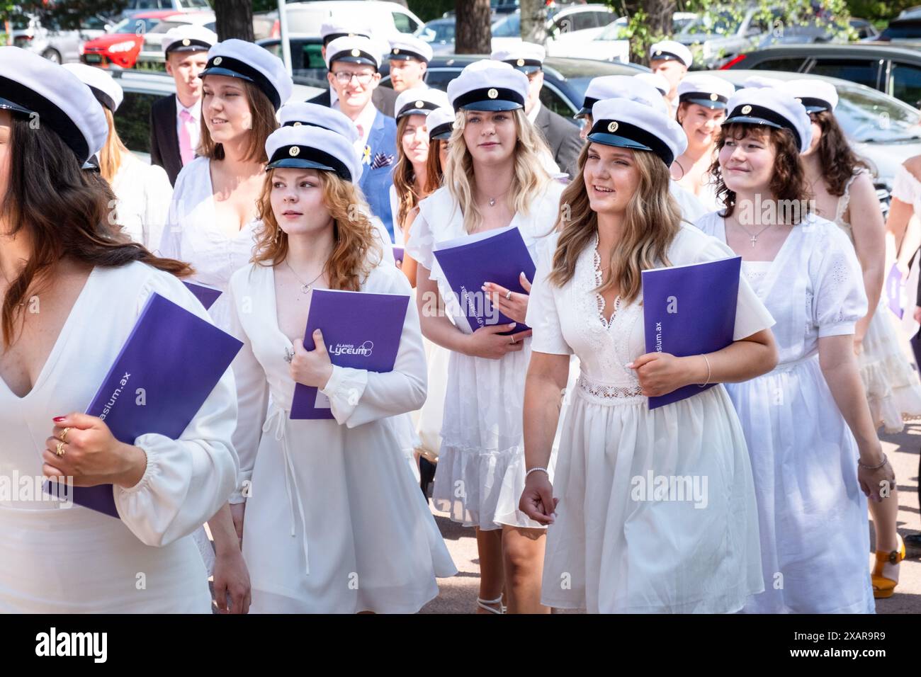 The new school graduates march through the streets of Mariehamn from ...