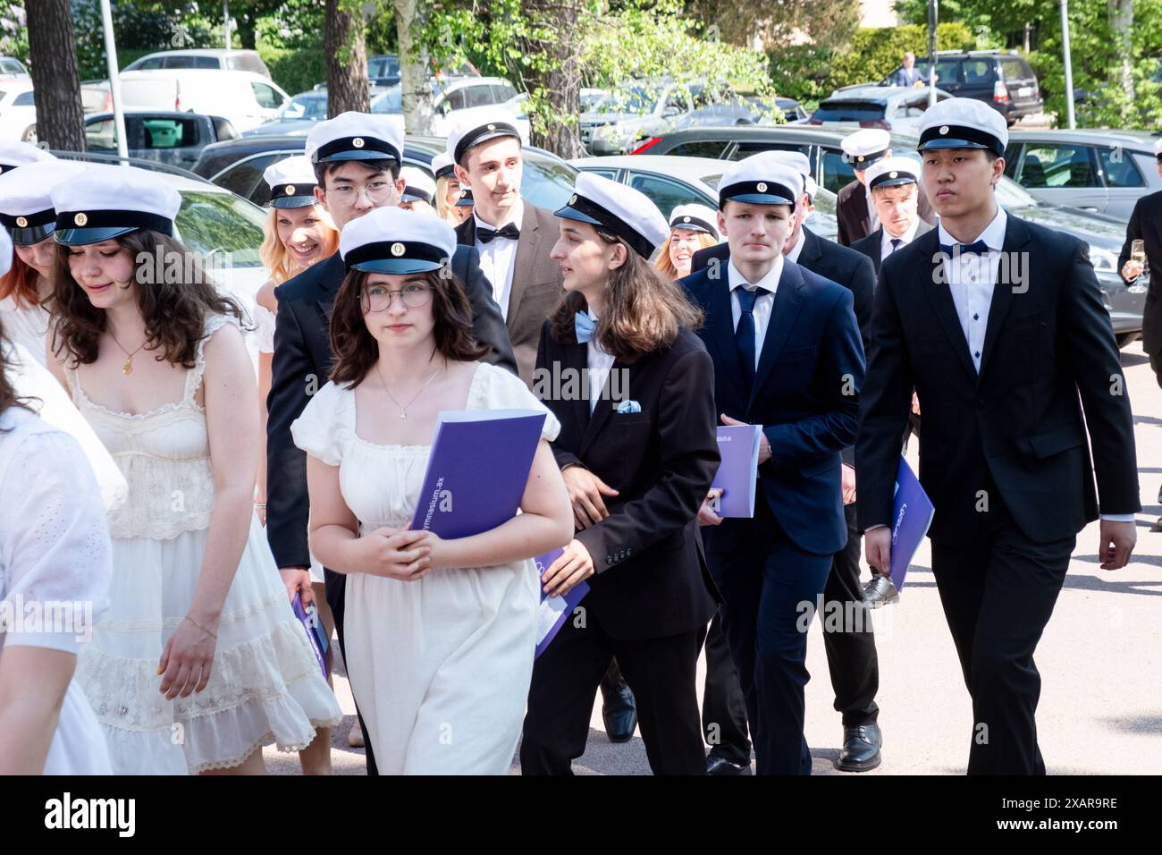 The new school graduates march through the streets of Mariehamn from ...