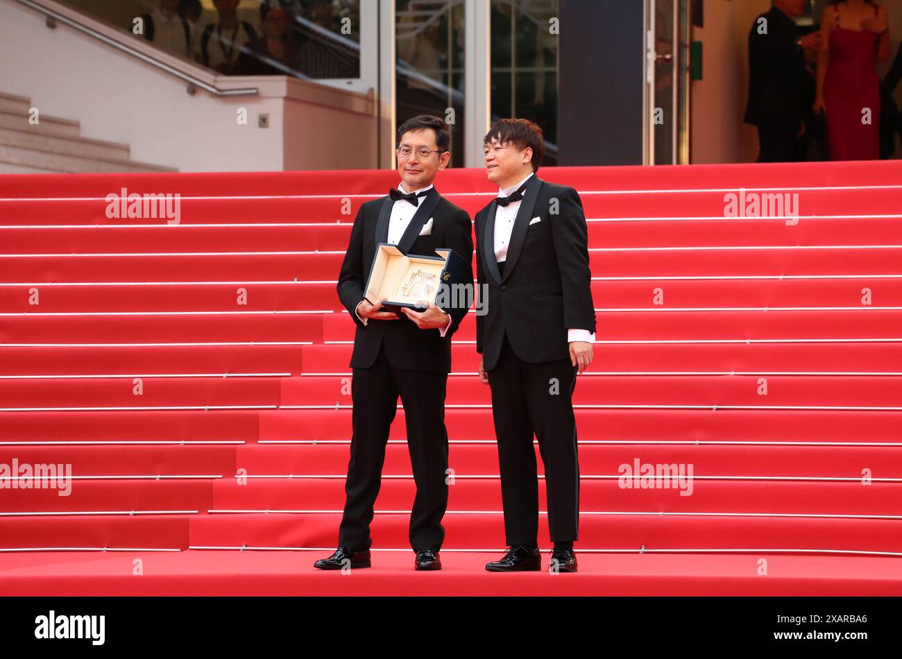 Cannes, France, 20th May, 2024. Gorō Miyazaki and Kenichi Yoda with the ...