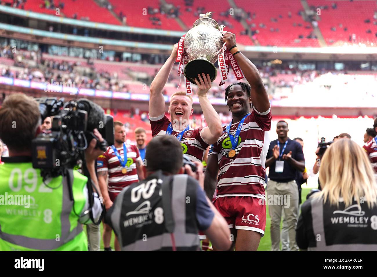 Wigan Warriors' Zach Eckersley (left) and Wigan Warriors' Junior Nsemba ...