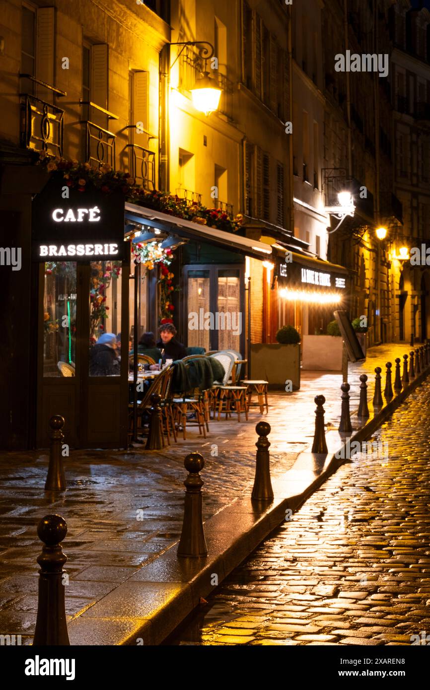 The exterior of a traditional cafe on Place Dauphine on the Il de la ...