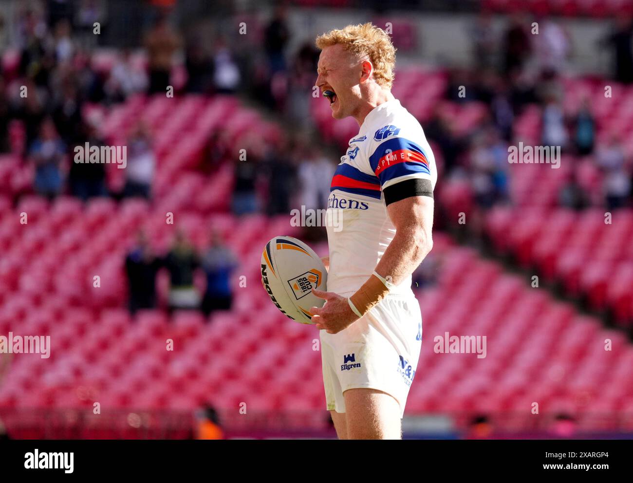 Wakefield Trinity's Lachlan Walmsley celebrates after scoring a try ...