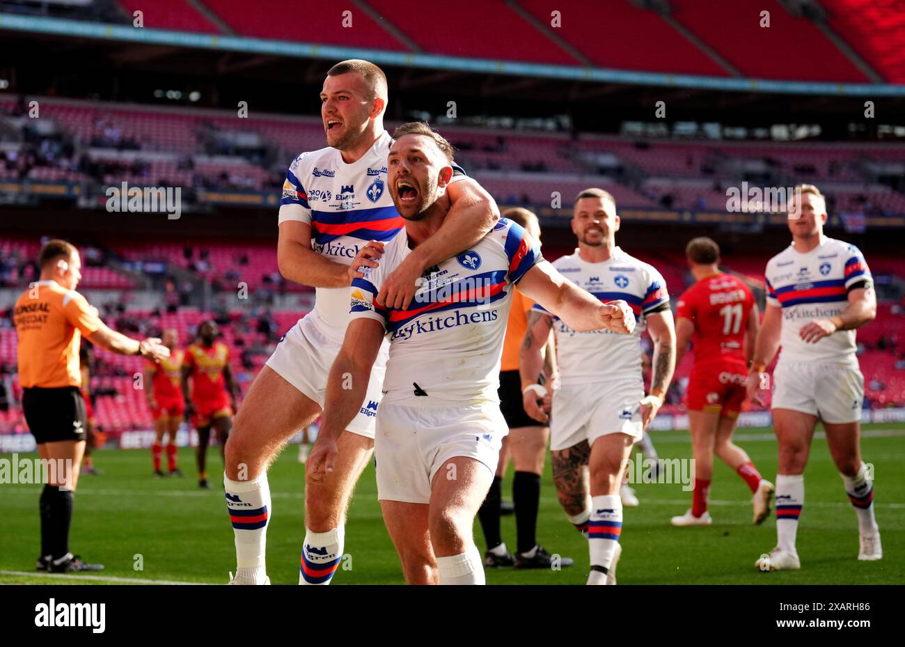 Wakefield Trinity's Luke Gale (right) celebrates after scoring a try ...