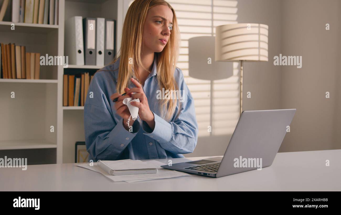 Caucasian businesswoman write business idea paperwork writing stress ...