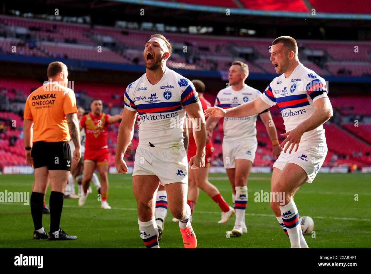 Wakefield Trinity's Luke Gale (left) celebrates after scoring a try ...