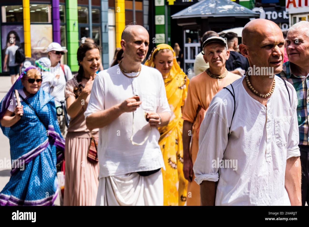 Kharkiv, Ukraine, June 8, 2024 Ukrainian Hare Krishna devotees dance and sing in the streets.The ...
