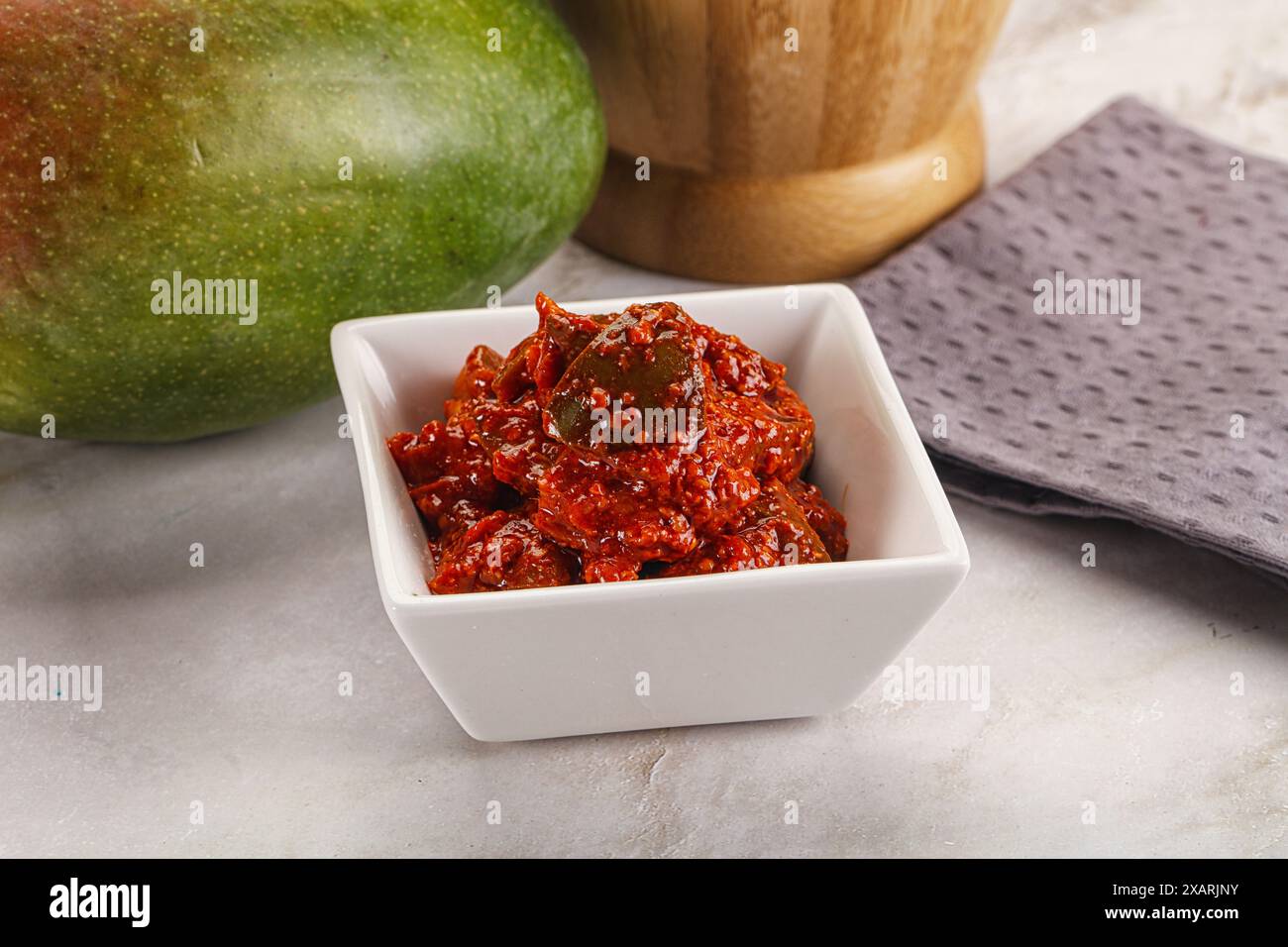 Indian cuisine Spicy pickled raw green mango Stock Photo - Alamy