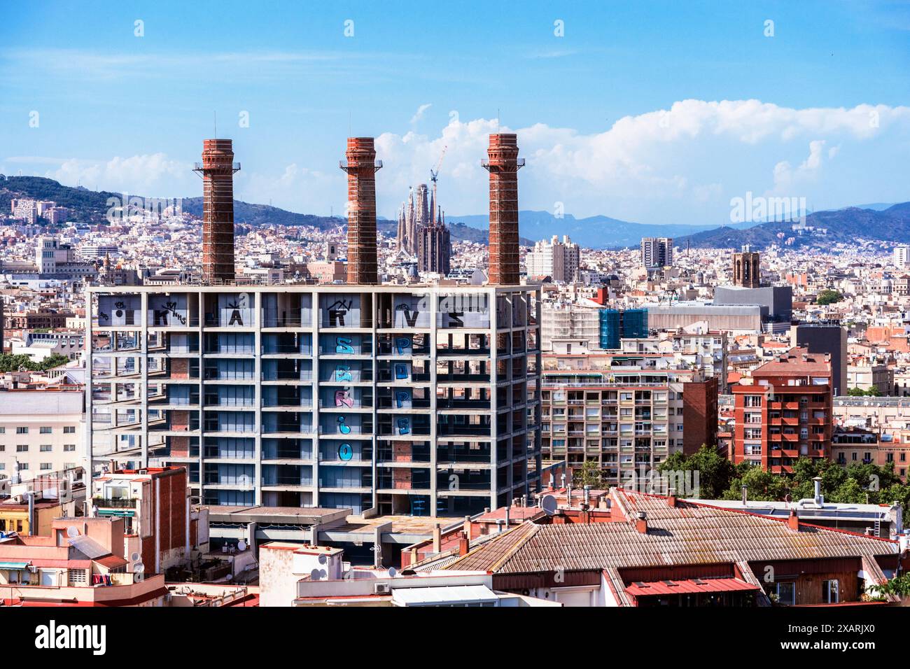Barcelona cityscape seen from Montjuic with 3 Chimneys and Sagrada ...