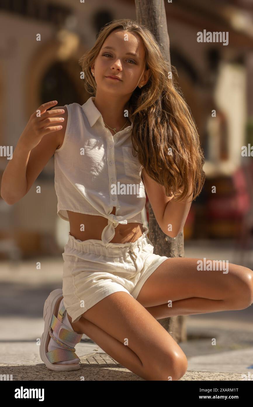 This image is a detailed portrait of a beautiful young girl, capturing ...