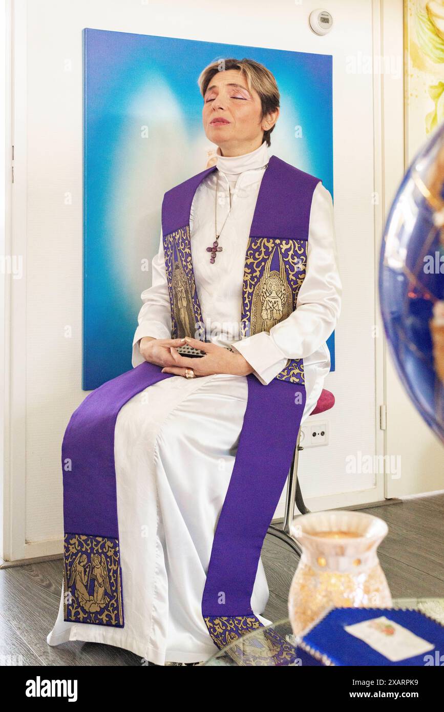 Female Spiritual Leader Performing a Service Female Spiritual Leader ...