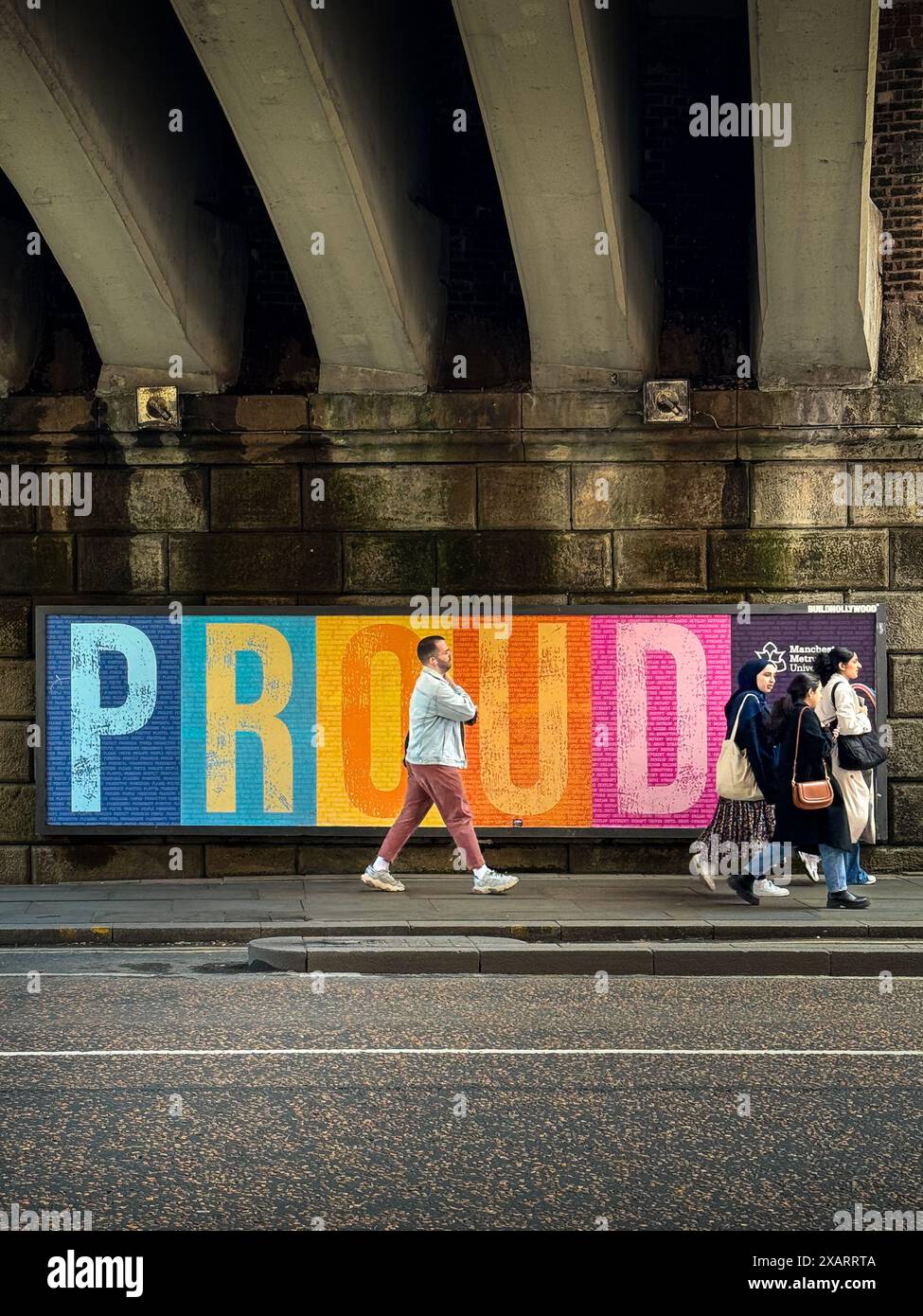 University of Manchester 'PROUD' poster on Oxford Road Stock Photo - Alamy