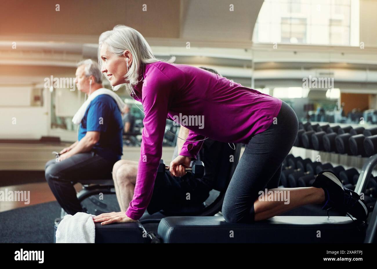 Mature woman, bench and weightlifting with dumbbell for workout ...