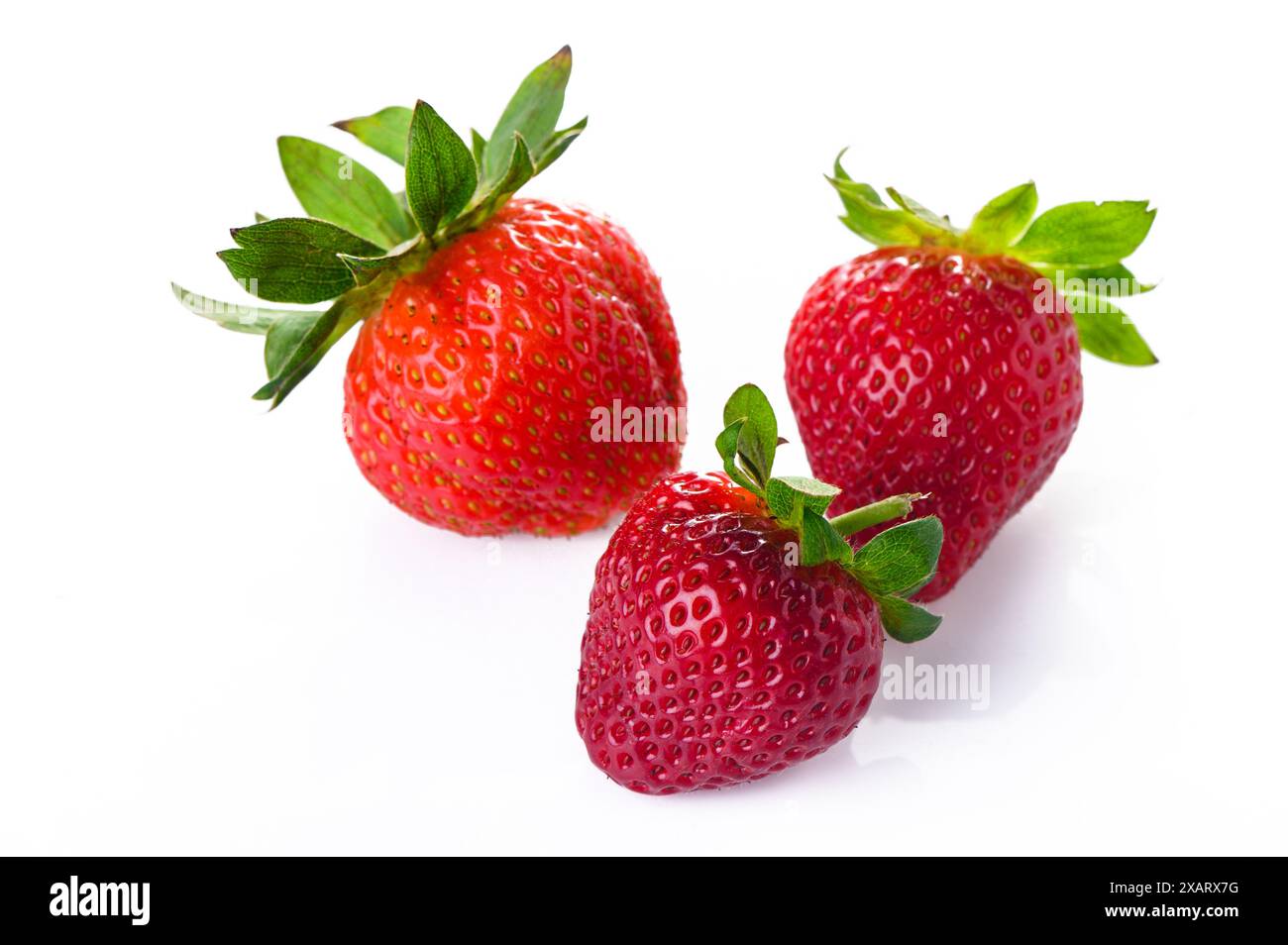 Set of ripe strawberries. Whole and cut berries isolated on white ...