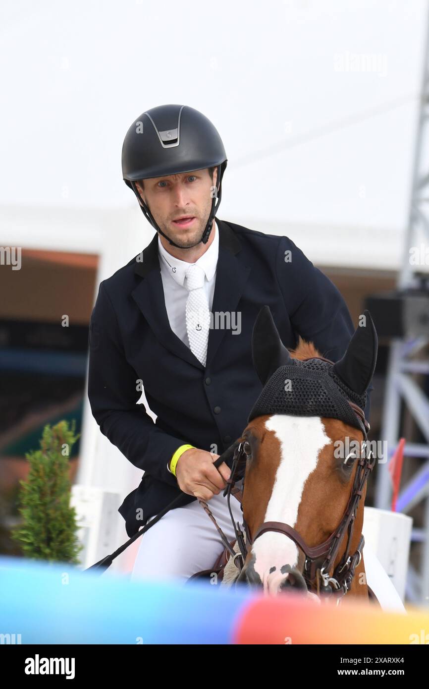 CANNES, FRANCE - JUNE 08: Pieter Devos riders takes part in the ...