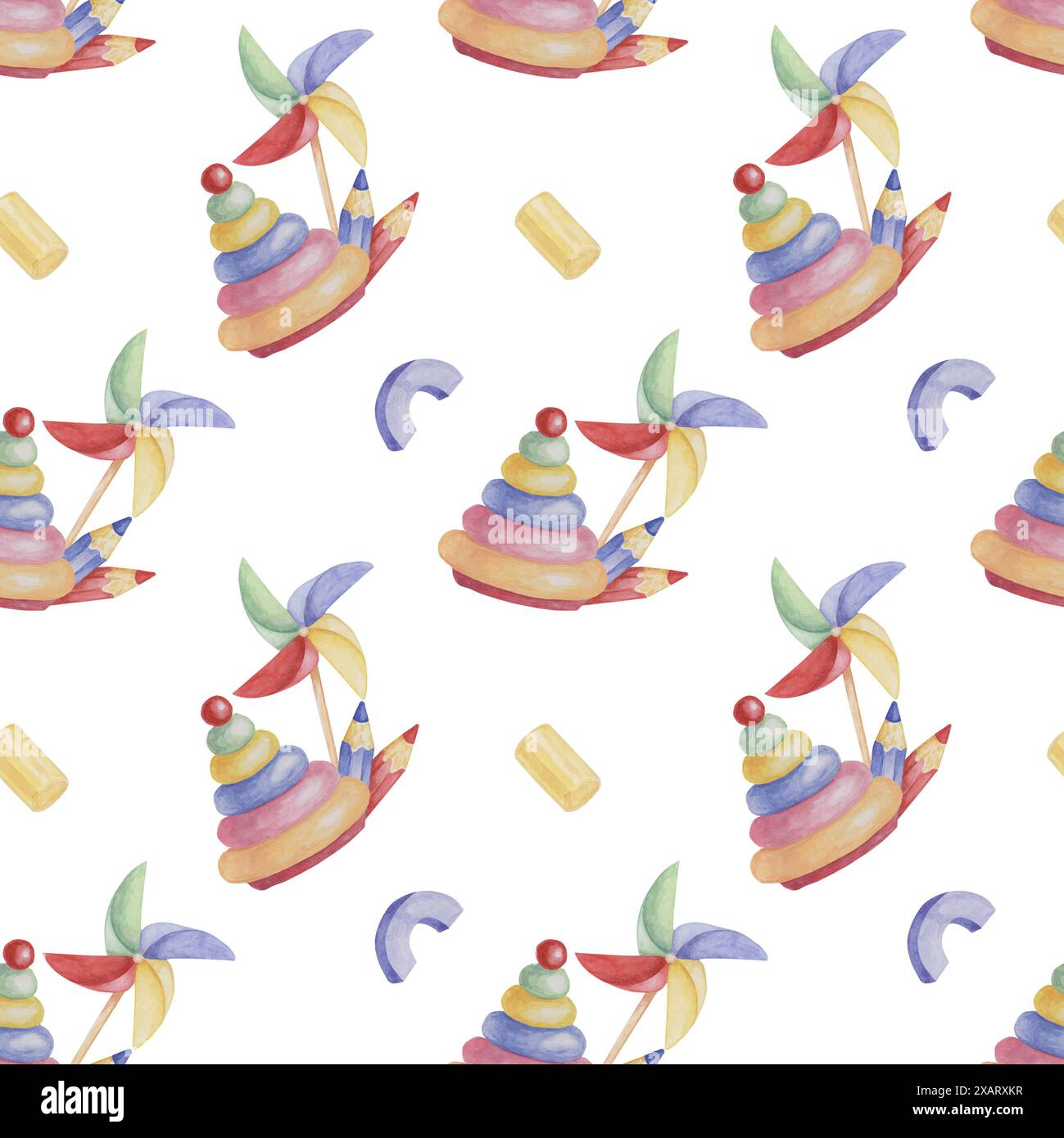 Stacking rings tower, pinwheel and crayons. Colored pencils and toys ...