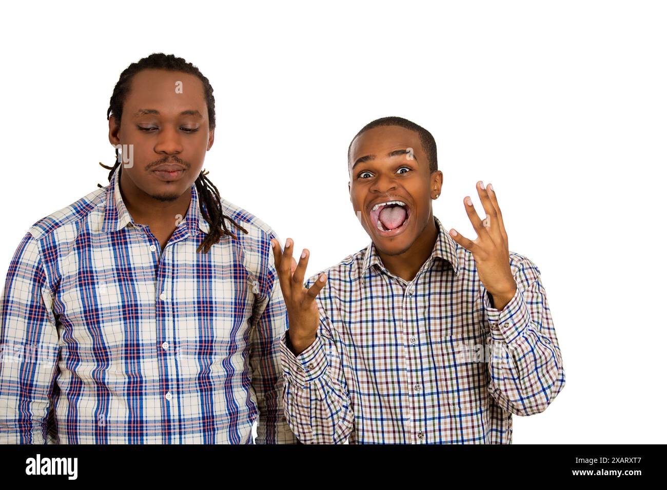 two men, friends, one being excited, smiling, happy, other serious ...