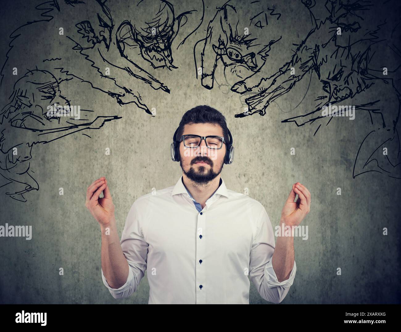 Stress free man meditating listening to music not listening to angry ...