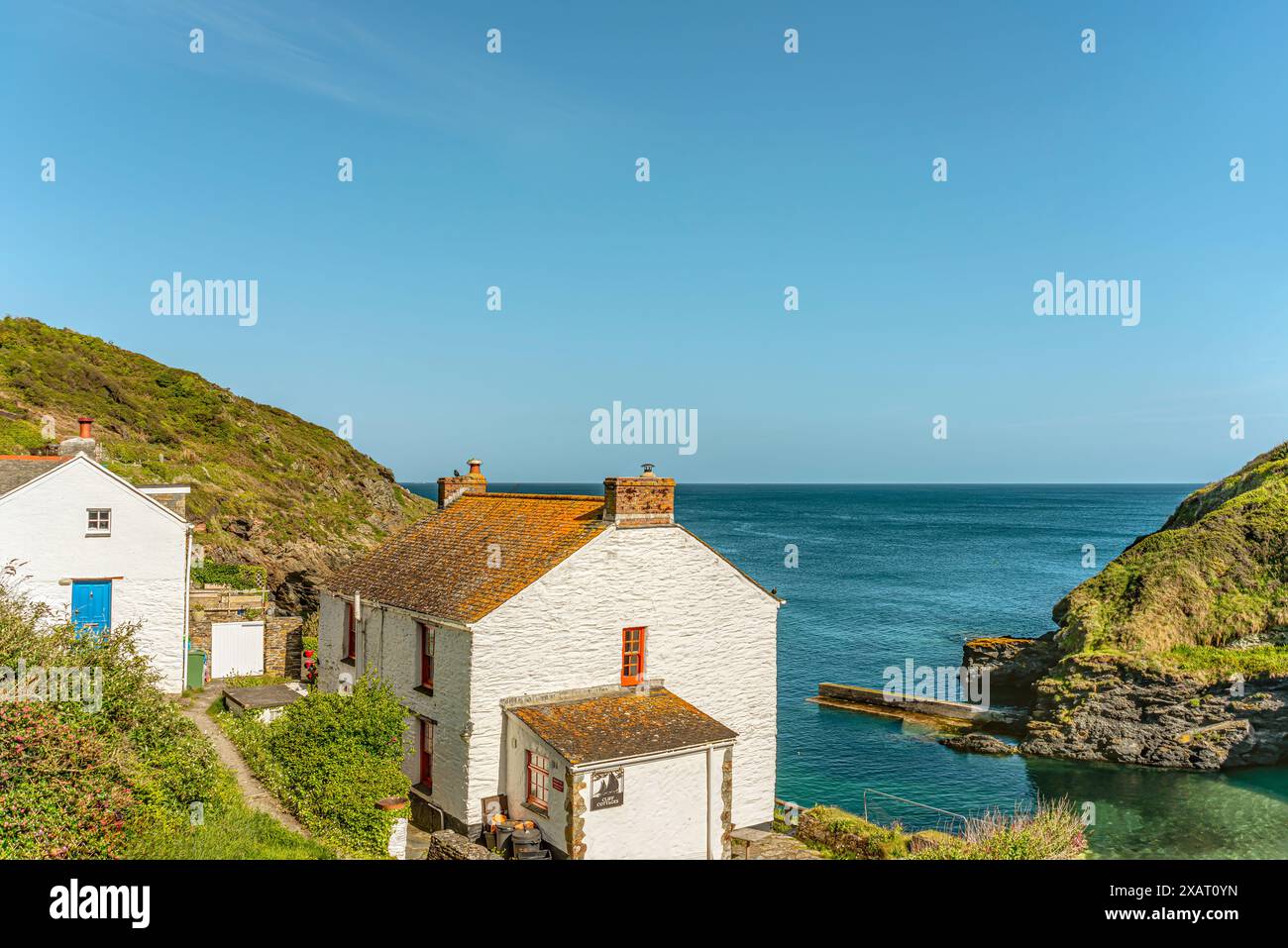 Cottage at the fishing harbour of the coastal Cornish village Portloe ...