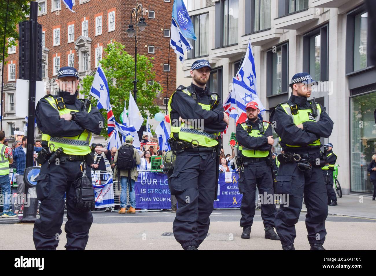 London, UK. 08th June, 2024. Police officers form a cordon in front of ...