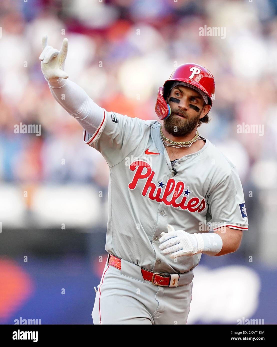 Philadelphia Phillies' Bryce Harper celebrates a home run on day one of ...