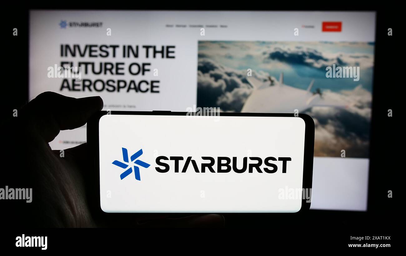 Person holding cellphone with logo of US venture capital company ...