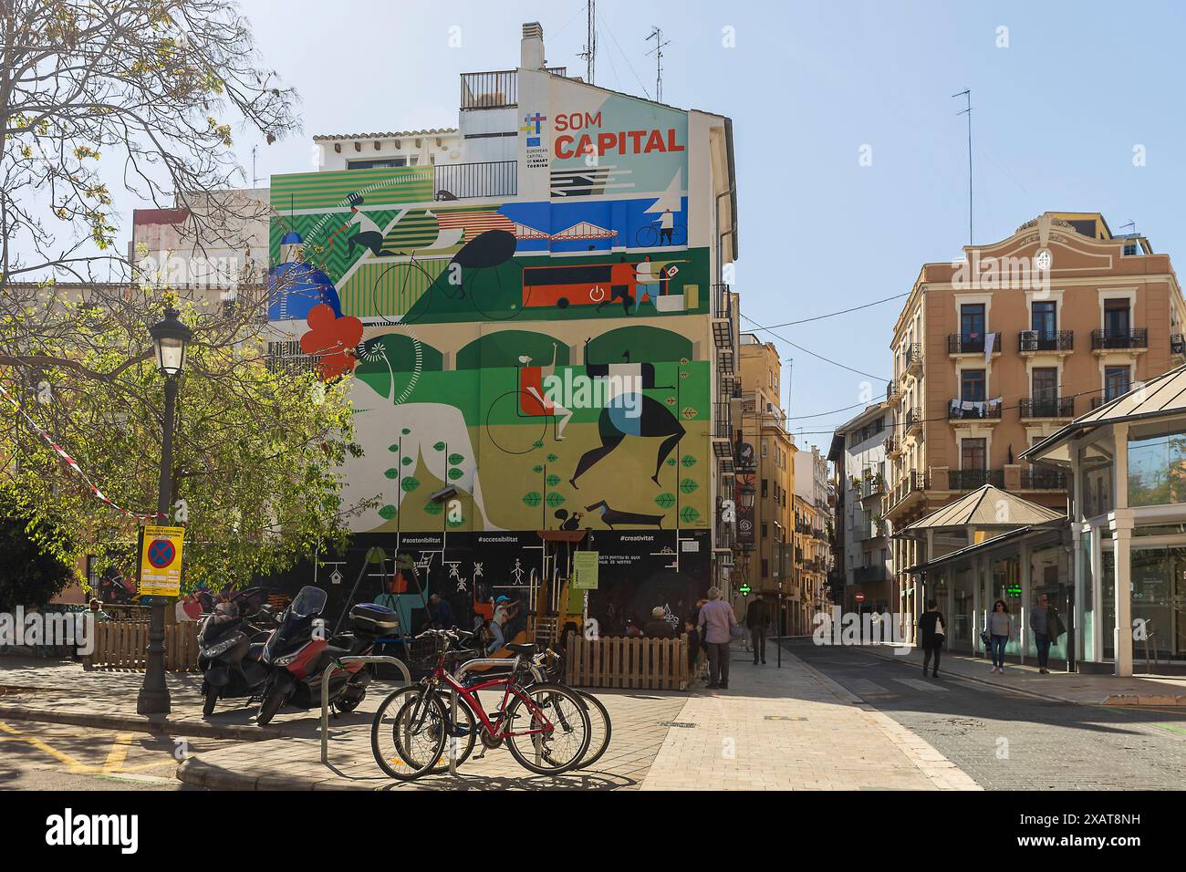 VALENCIA, SPAIN - May 2, 2024: Narrow streets with colorful houses in ...