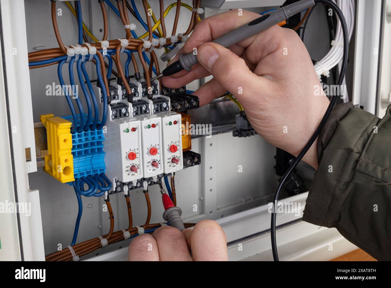 Electrician Working on Circuit Breaker Panel Stock Photo - Alamy