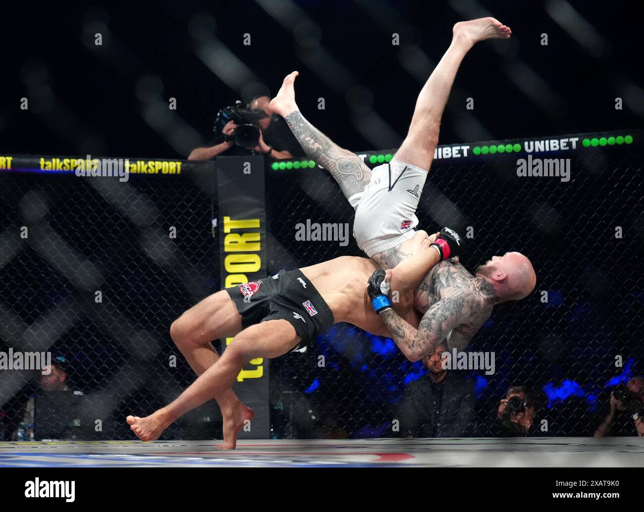 Charlie Leary is thrown by Jack Grant in their Welterweight tournament ...