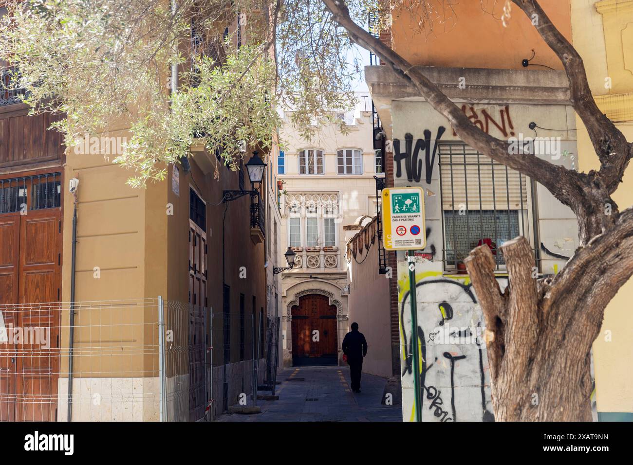 VALENCIA, SPAIN - May 2, 2024: Narrow streets with colorful houses in ...
