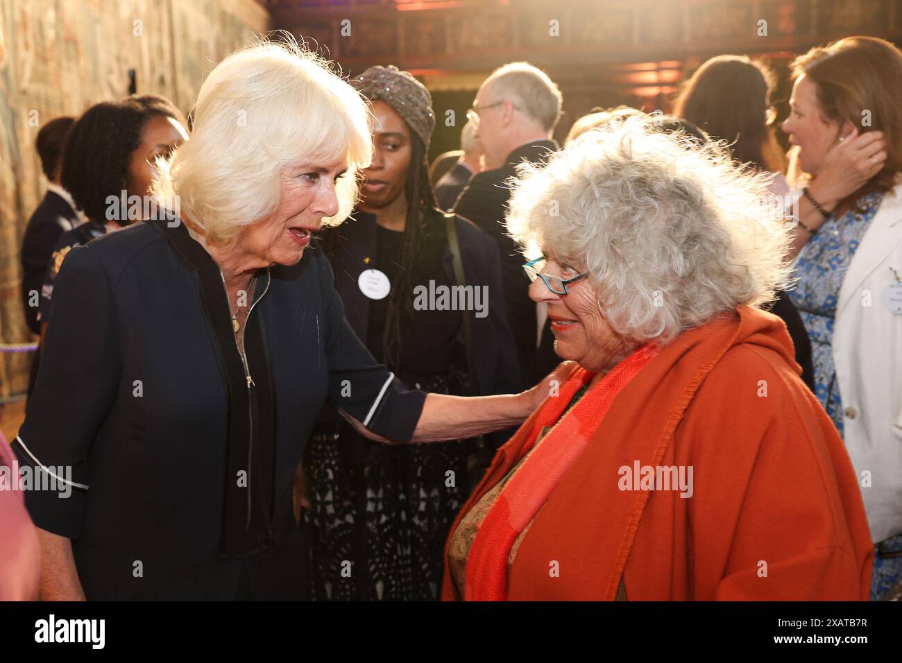 Queen Camilla (left) speaks with Miriam Margolyes during a reception ...